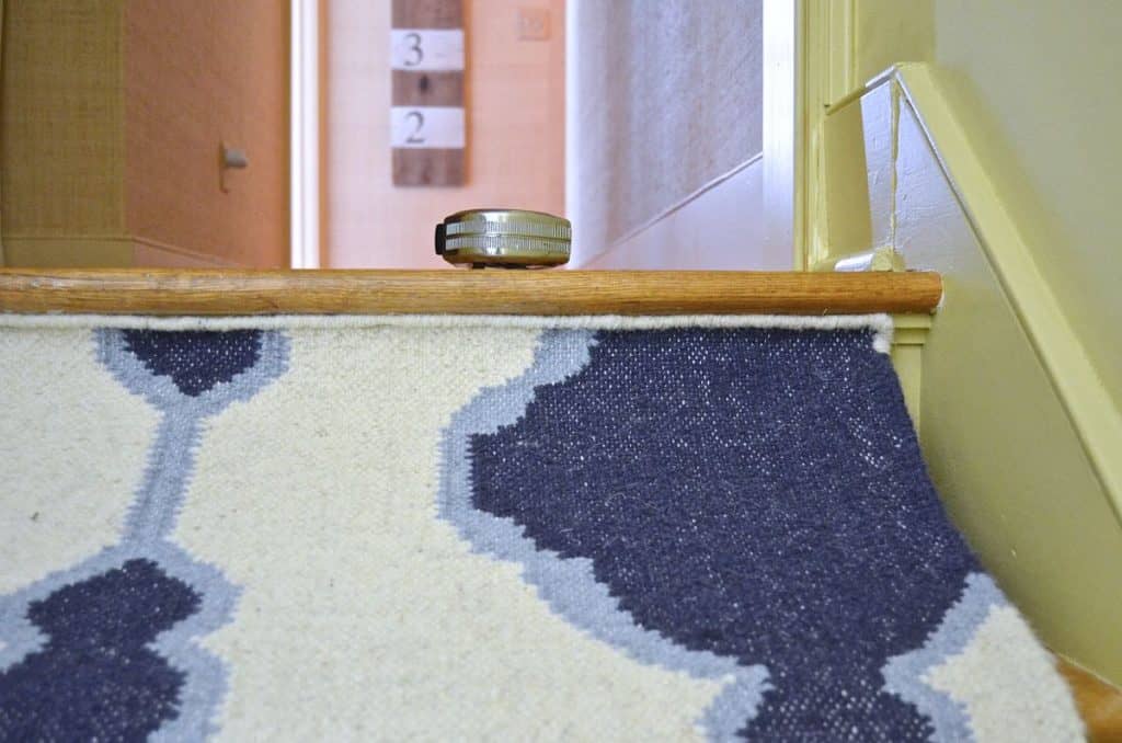 DIY Staircase Runner with Stair Rods